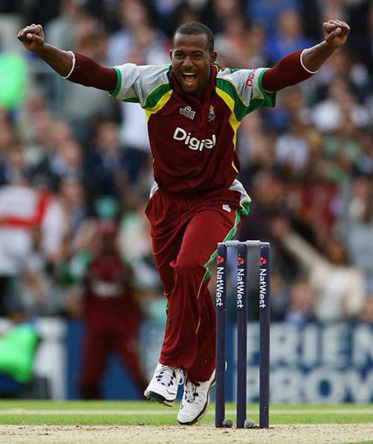 Dwayne Smith celebrates the wicket of Alastair Cook | ESPNcricinfo.com