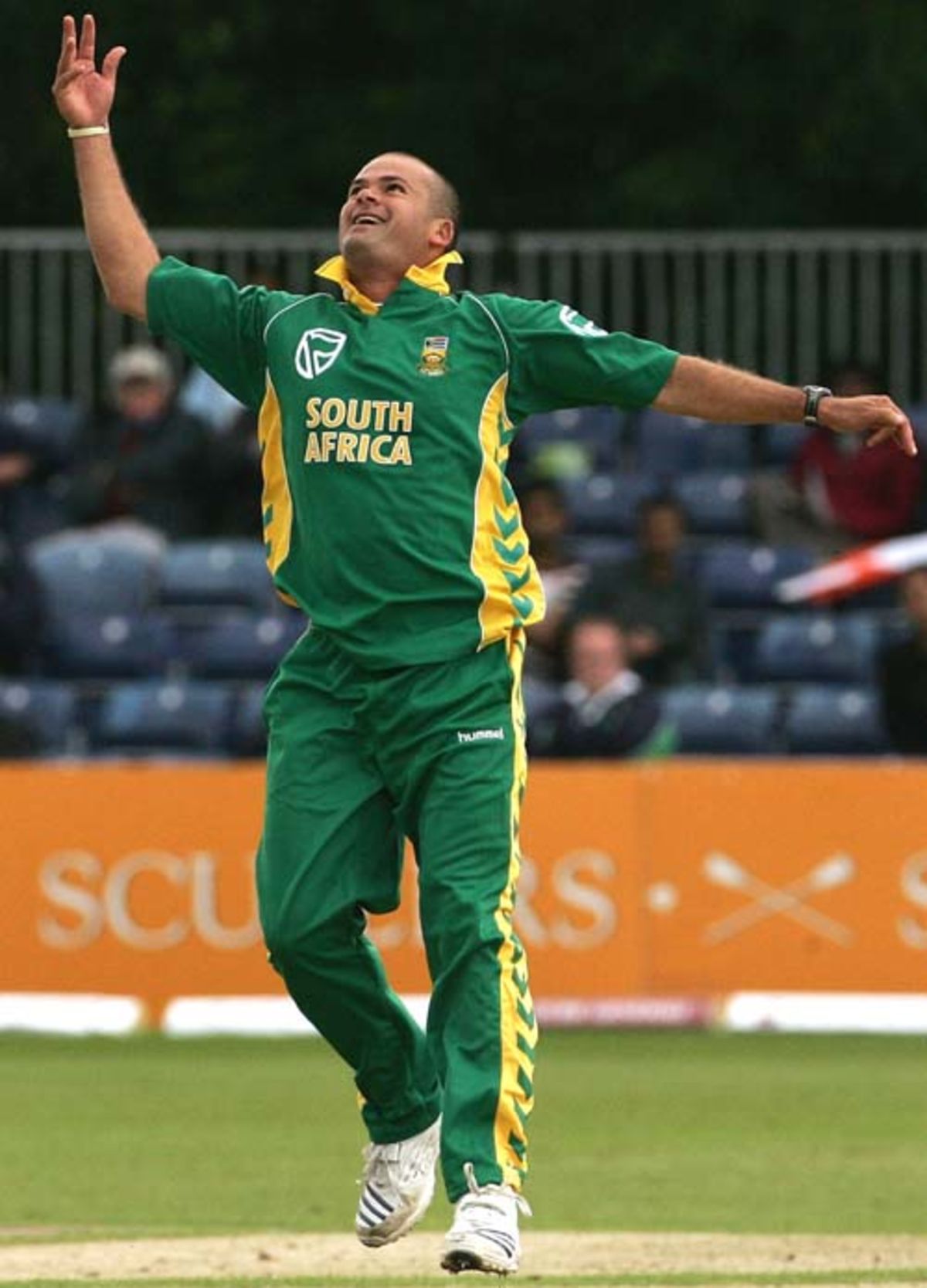 Charl Langeveldt celebrates after catching Rahul Dravid off his own ...