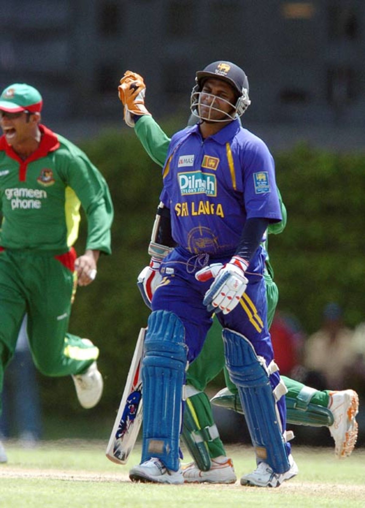 Syed Rasel celebrates the dismissal of Sanath Jayasuriya | ESPNcricinfo.com