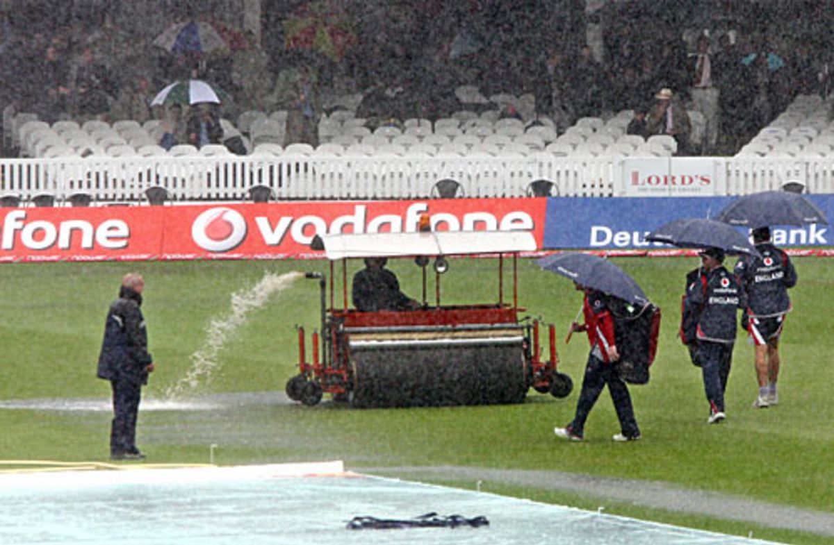 The Super Sopper dredges water from the outfield at Lord's ...