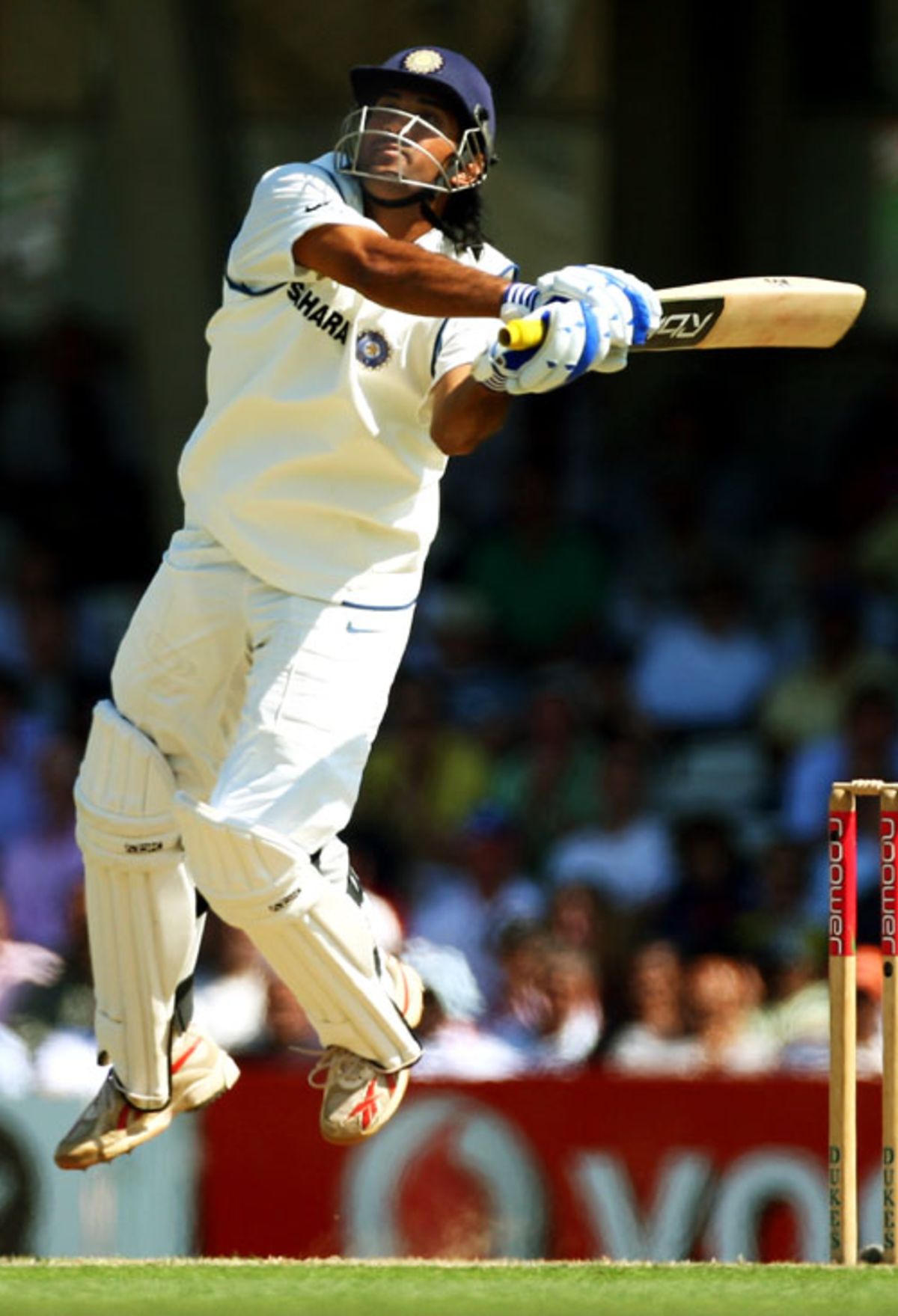 Mahendra Singh Dhoni is airborne as he smacks Monty Panesar over midwicket | ESPNcricinfo.com