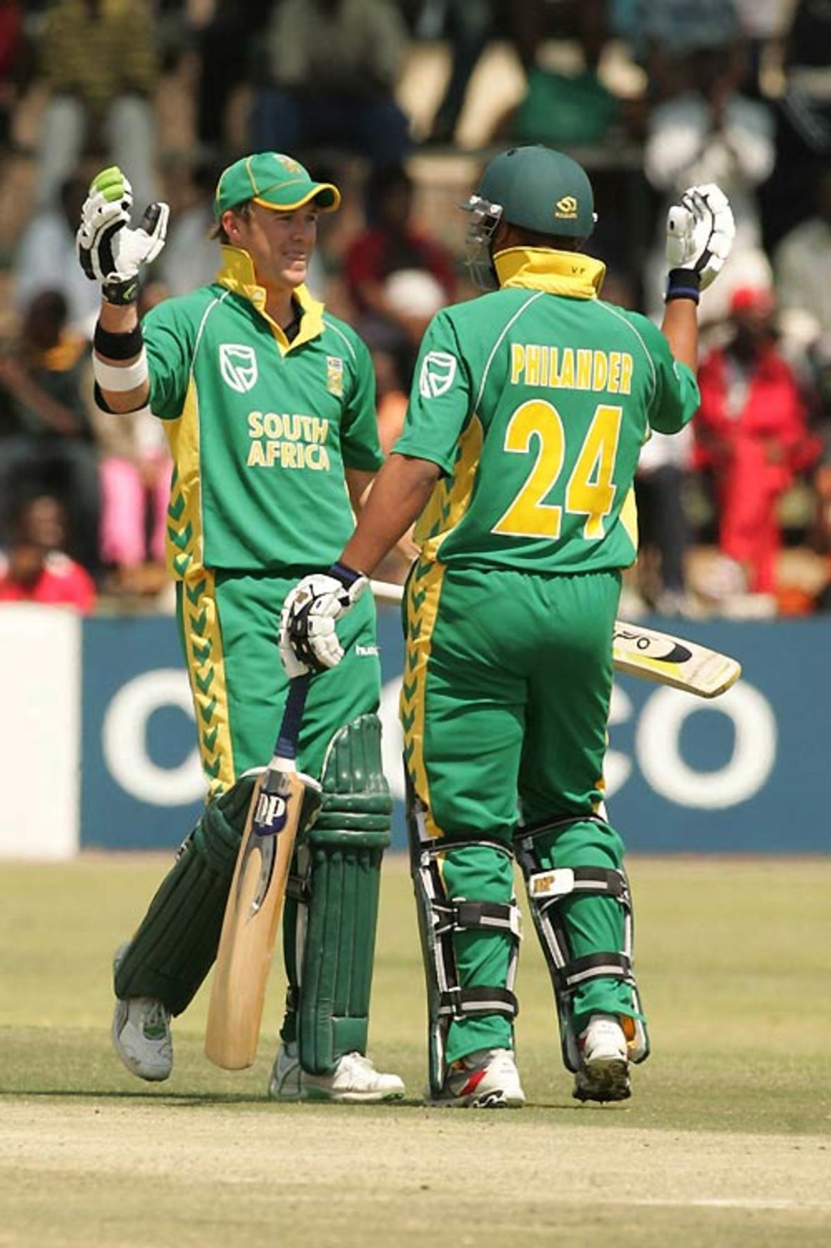 Vernon Philander congratulates AB de Villiers on reaching his century ...