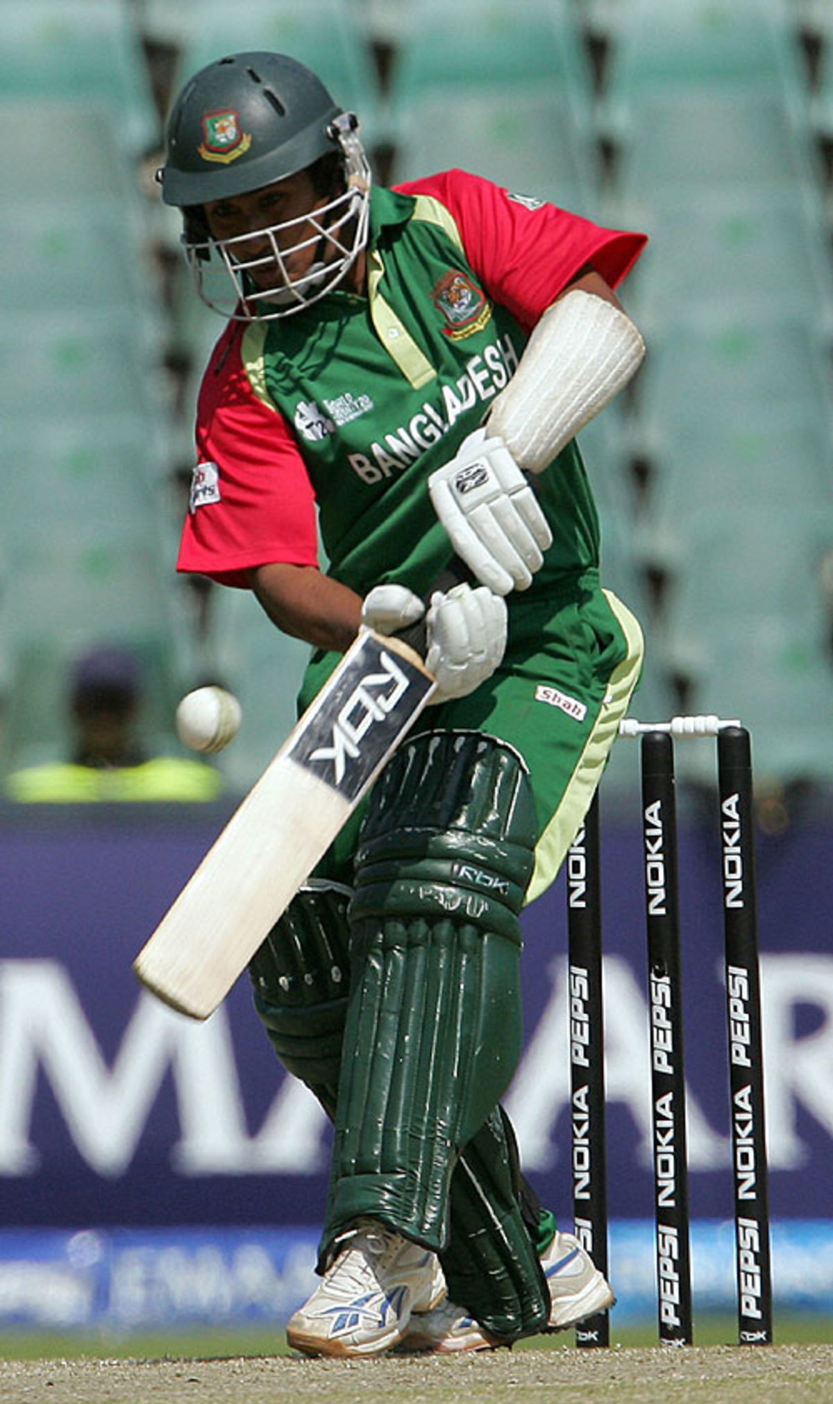 Mohammad Ashraful prepares to scoop one over the fine-leg boundary ...