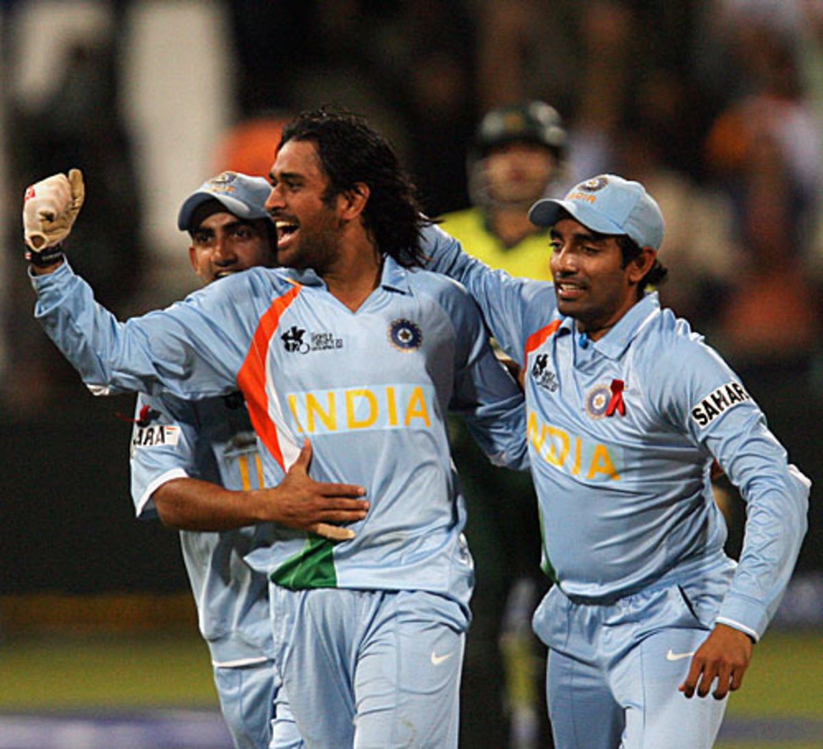 Mahendra Singh Dhoni is ecstatic after winning his first international ...