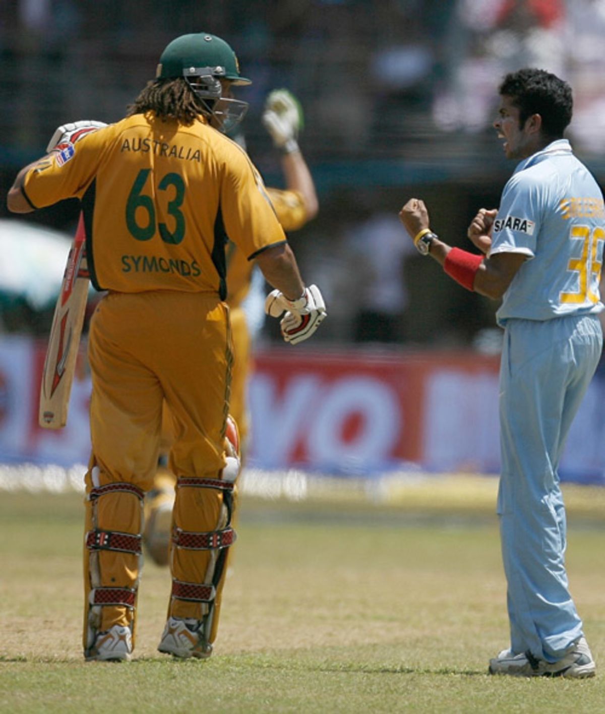 Andrew Symonds and Matthew Hayden pick up a single during their 94-run ...