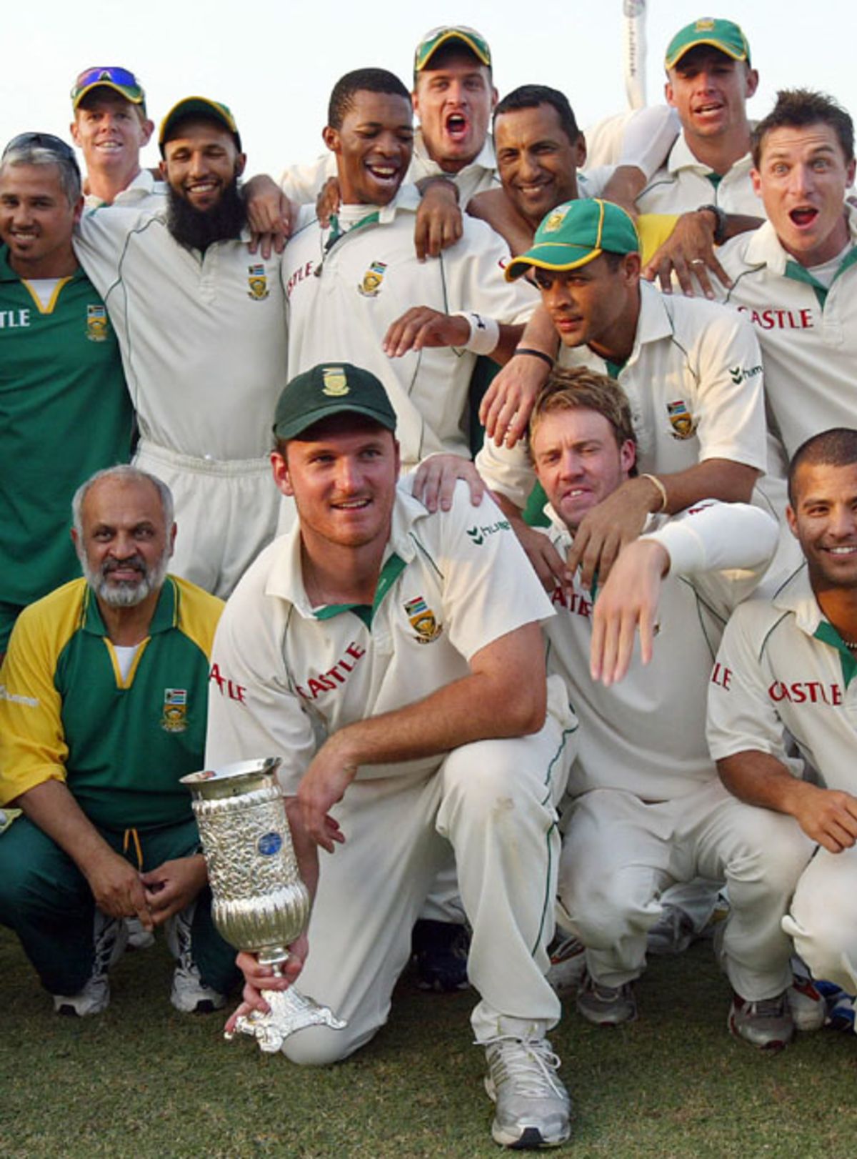 The victorious South African team pose with the series trophy ...