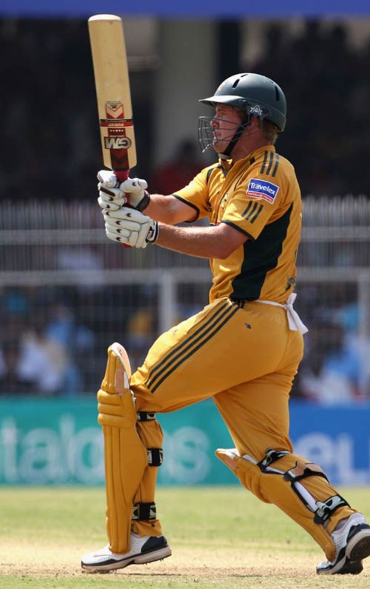Andrew Symonds raises his bat on reaching his century | ESPNcricinfo.com