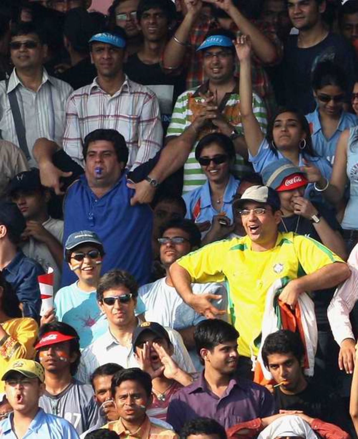 Spectators make "monkey" gestures at the Wankhede Stadium ...