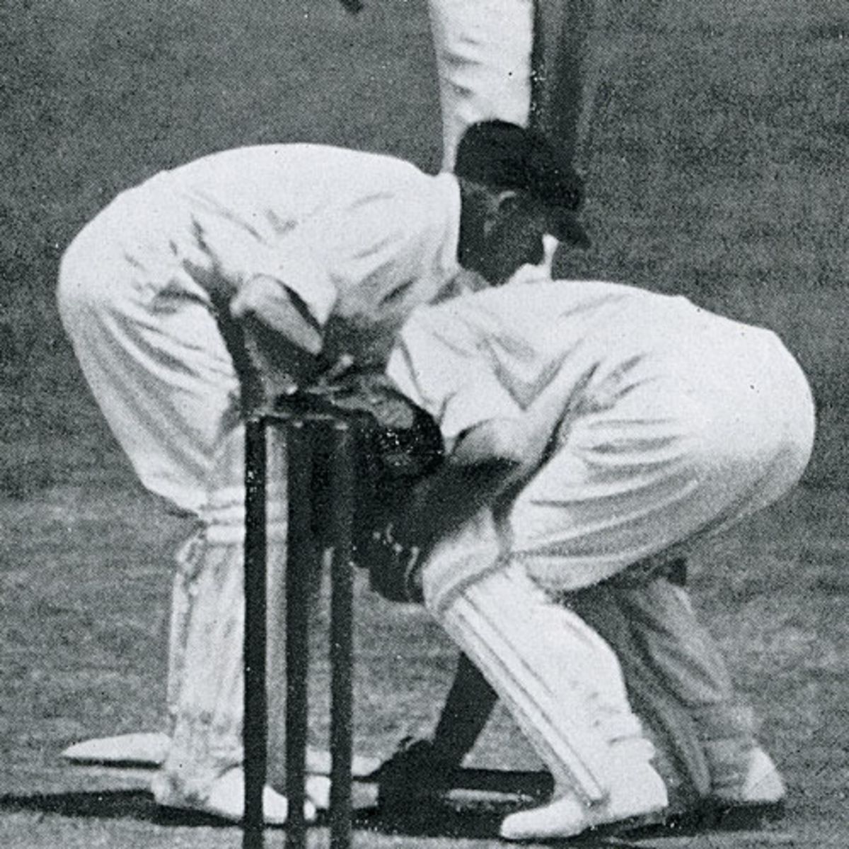 Bert Oldfield tends to Gubby Allen after he was struck by Lisle Nagel ...