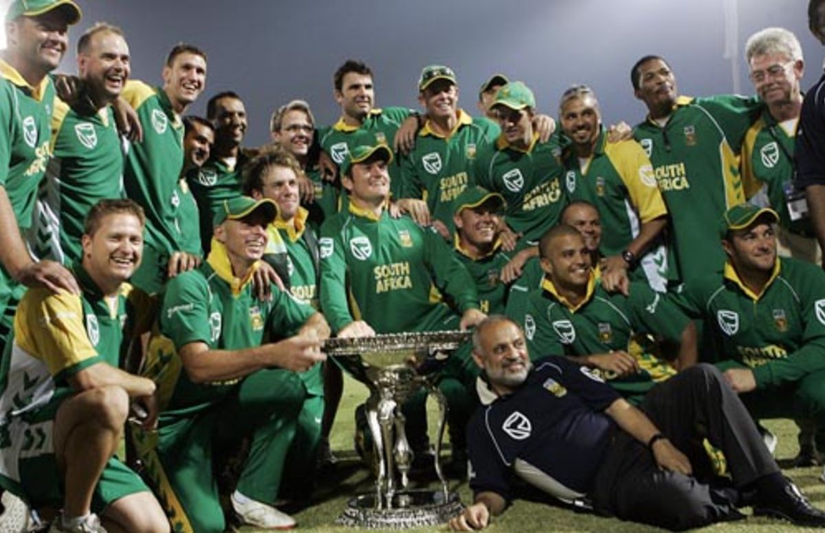 The victorious South Africa squad pose with the silverware ...