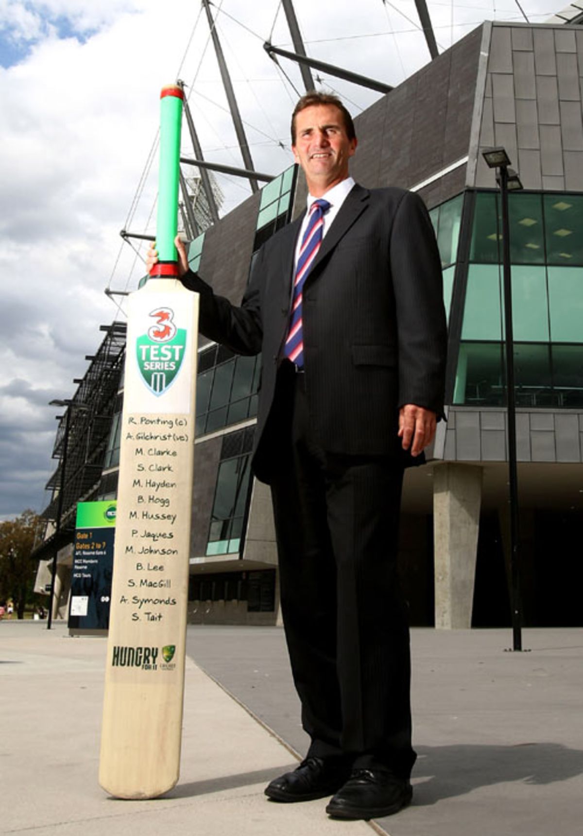 Andrew Hilditch, the chairman of selectors, with a bat which bears the ...