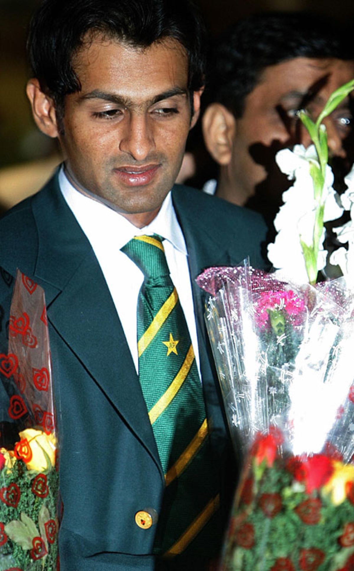 Andrew Hilditch, the chairman of selectors, with a bat which bears the ...