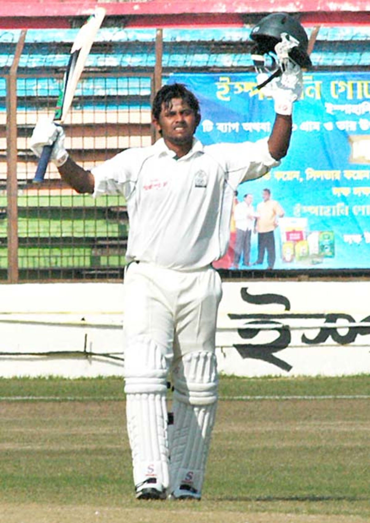 Shahriar Nafees acknowledges the cheers after reaching his century ...