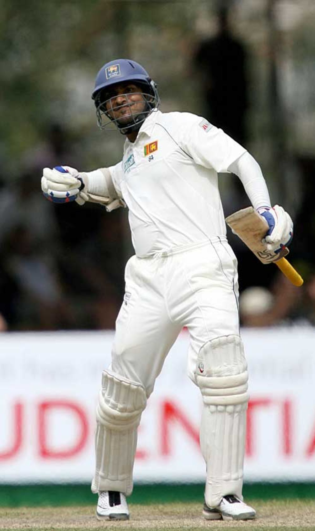 Kumar Sangakkara pumps the air after reaching his hundred ...