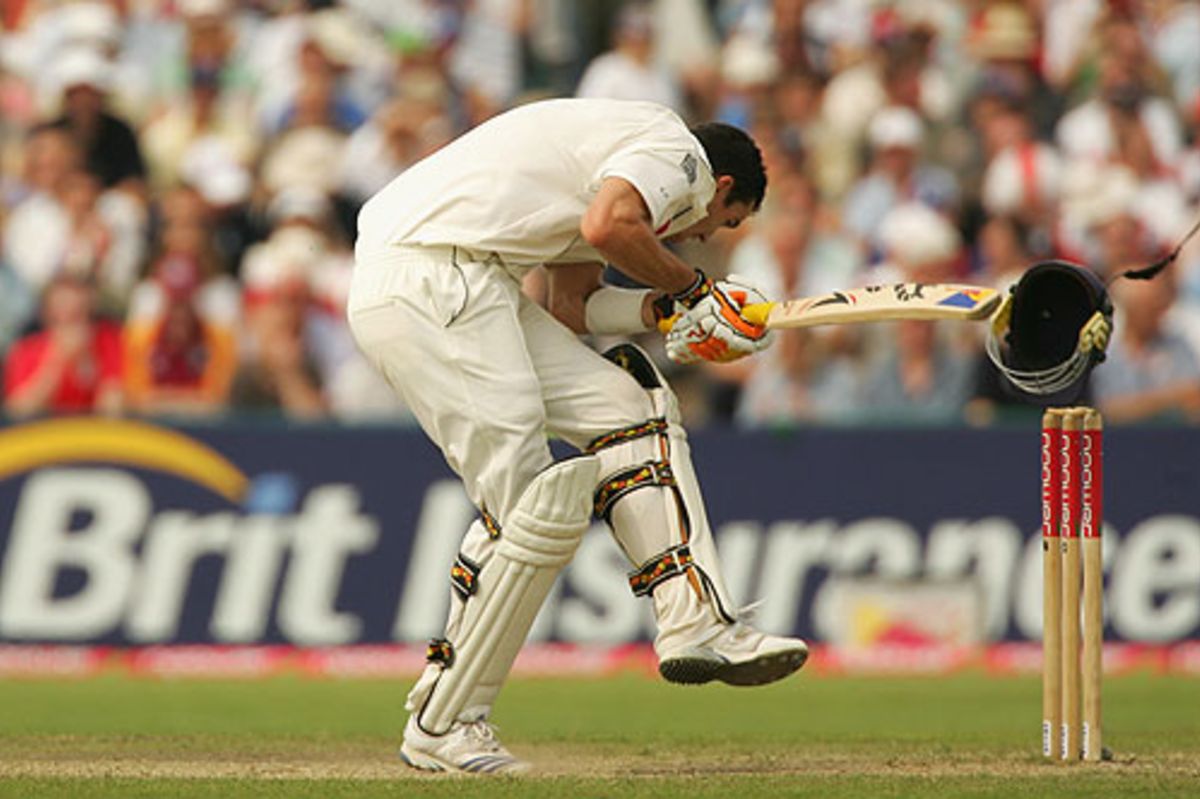 Kevin Pietersen is out hit wicket as his helmet falls onto the stumps ...