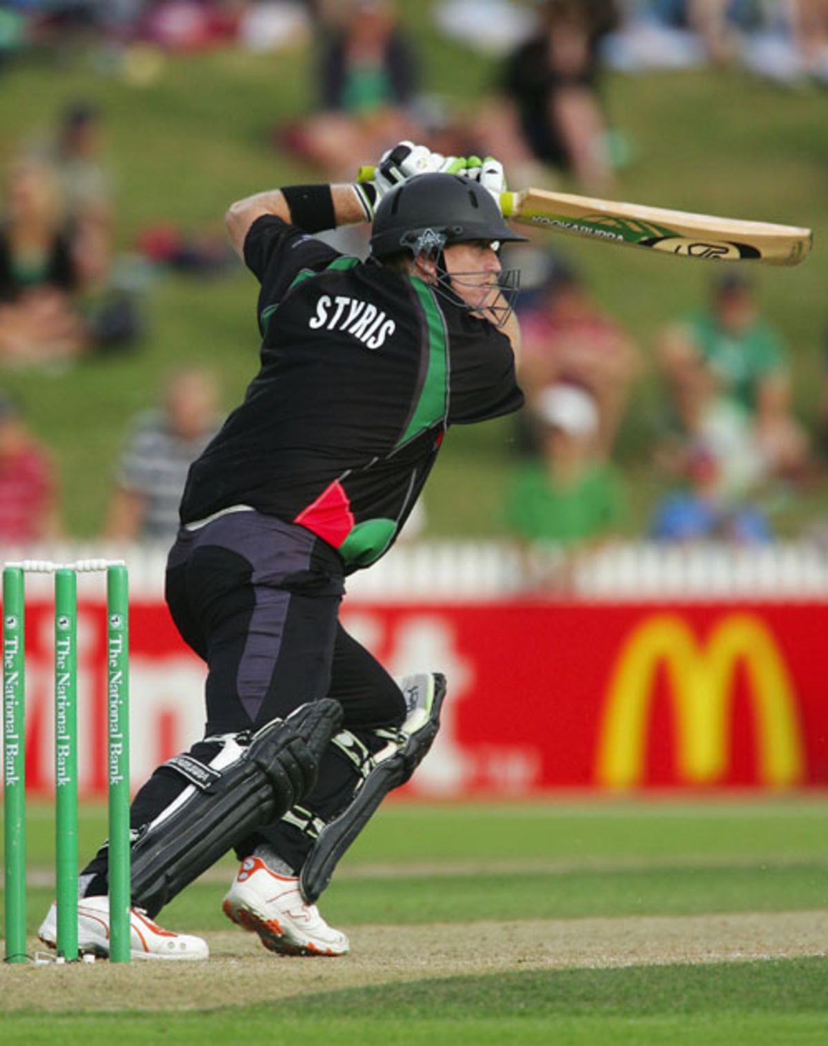 Scott Styris drives the ball through the covers during his 29 ...