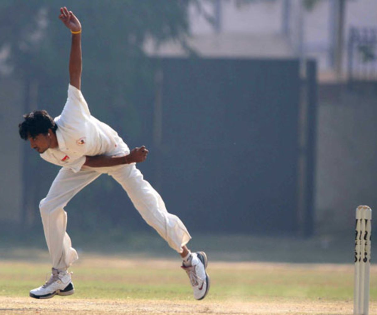 Gujarat's Siddharth Trivedi took six wickets to demolish Madhya Pradesh ...