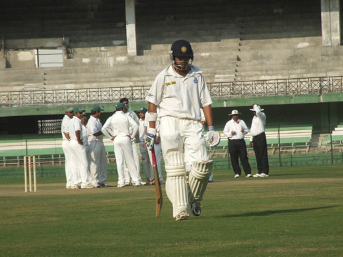 Amit Bhandari in his follow through | ESPNcricinfo.com
