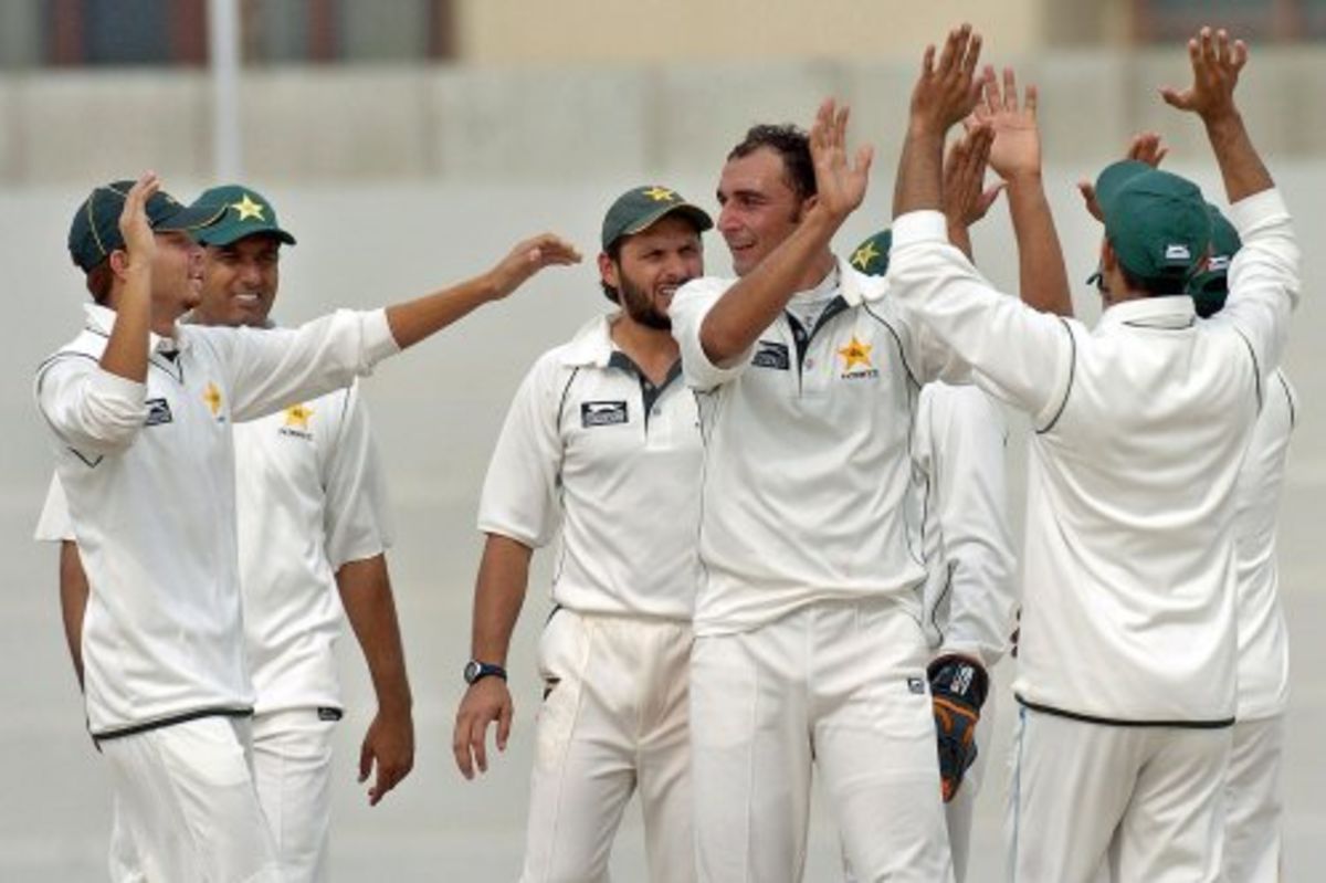 Samiullah Khan celebrates one of his three wickets | ESPNcricinfo.com
