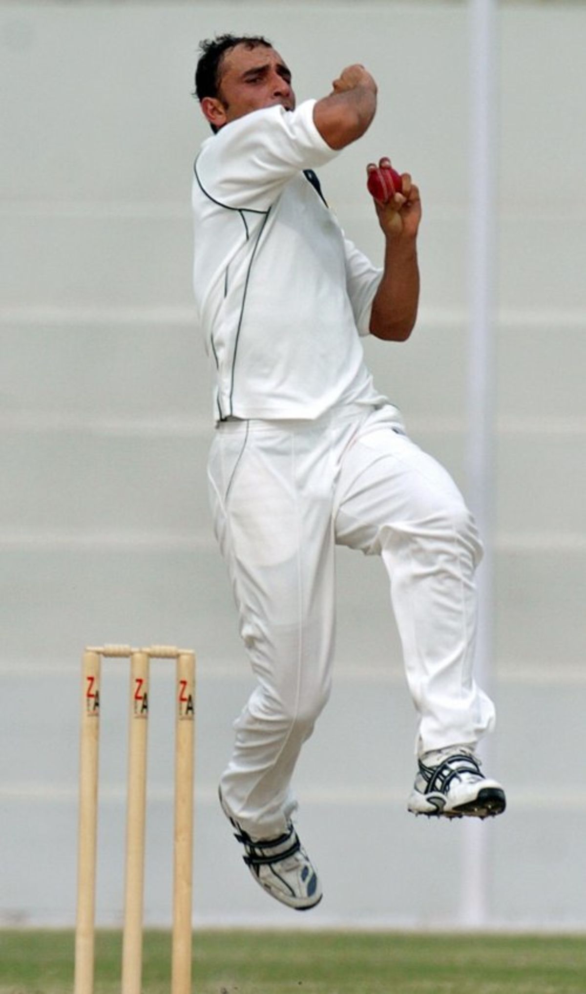 Samiullah Khan in his delivery stride | ESPNcricinfo.com