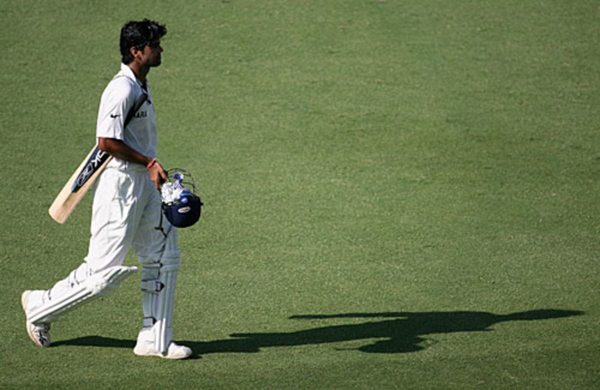 RP Singh walks back after getting his highest Test score | ESPNcricinfo.com