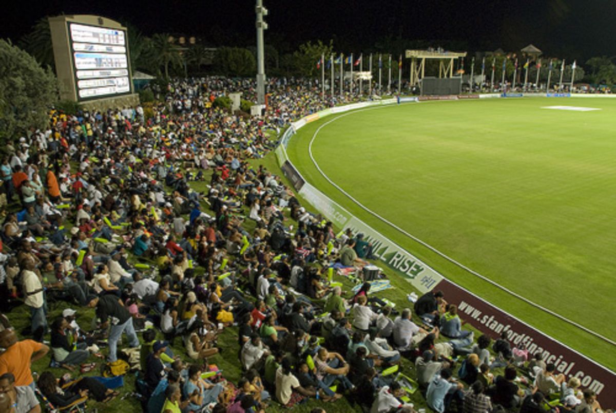 A giant screen relays the on-field action at the Stanford Cricket ...
