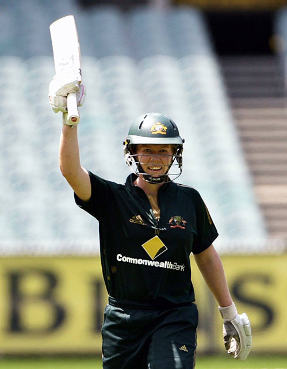 Alex Blackwell raises her bat after getting her maiden one-day hundred ...