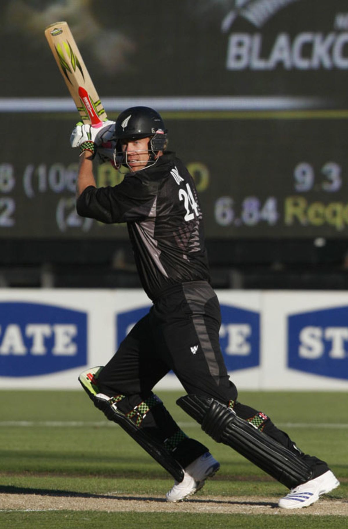 Jacob Oram stands tall to guide a crisply struck four past point ...