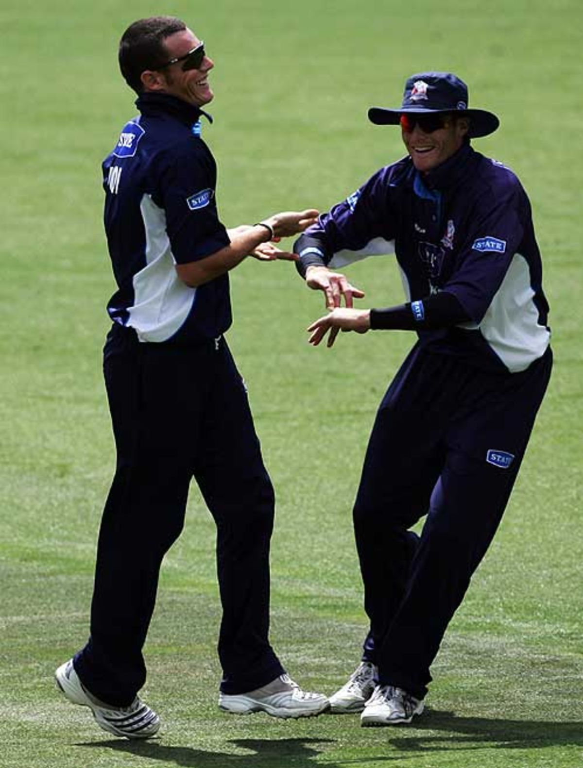 Auckland's Rob Nicol celebrates his dismissal of Peter Ingram ...
