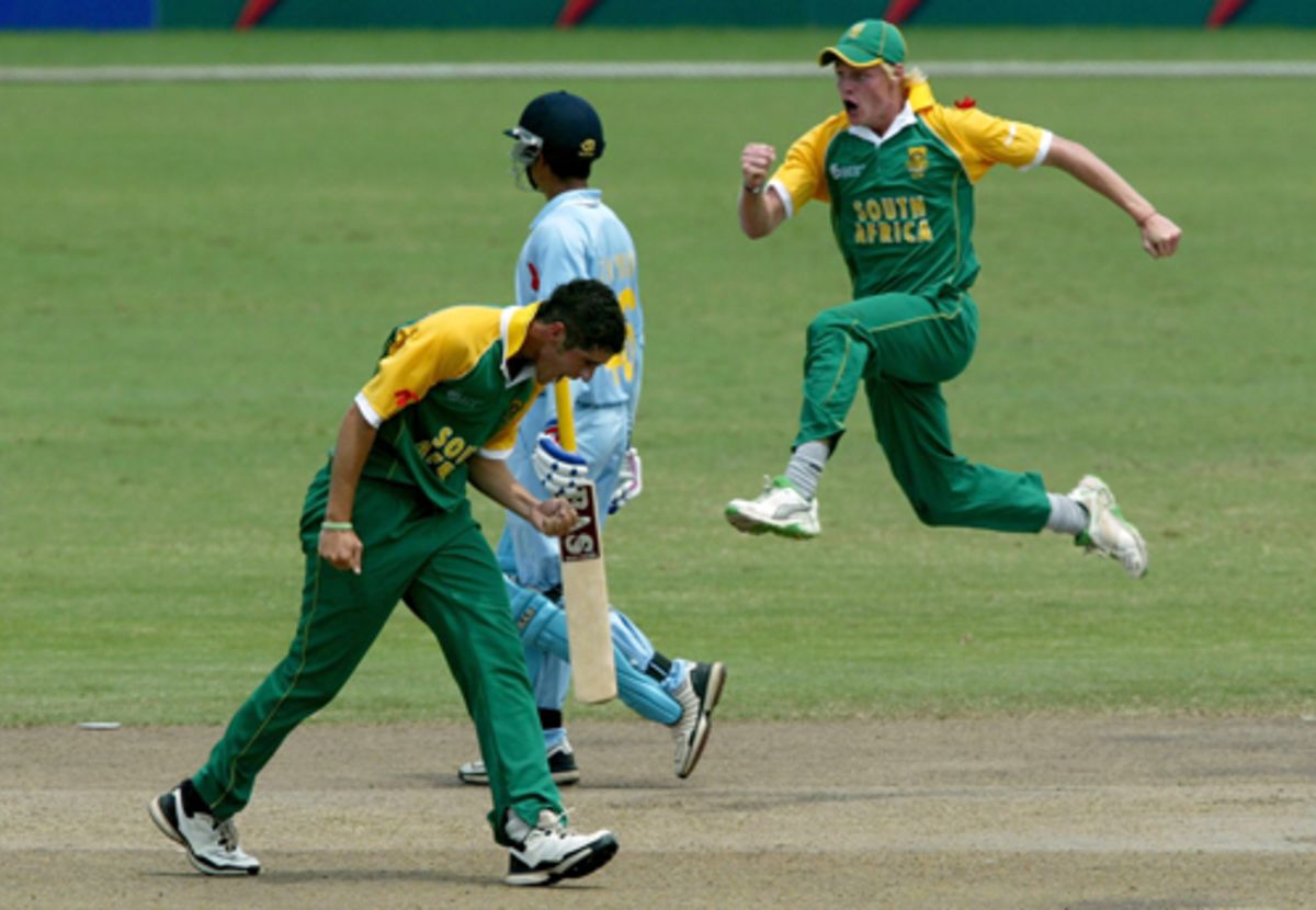 Wayne Parnell and Sybrand Engelbrecht celebrate Taruwar Kohli's ...