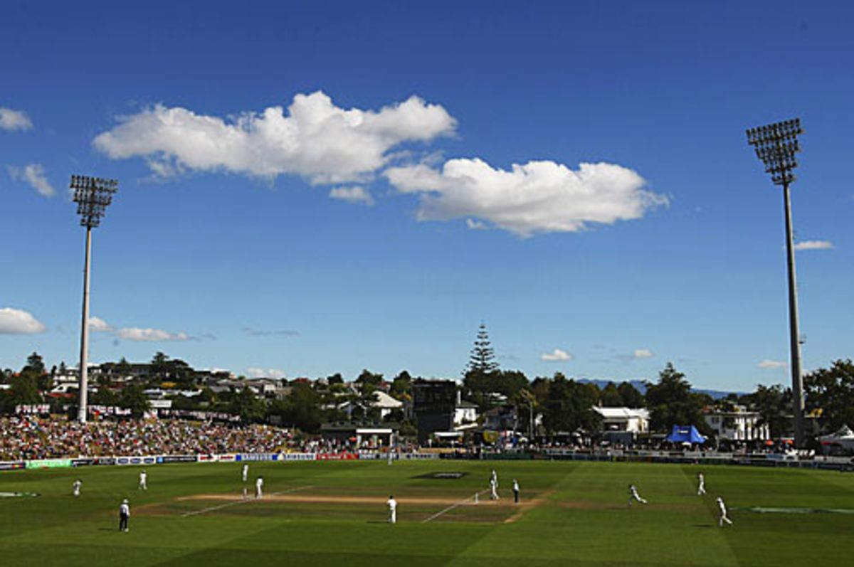 A wide-angle view of the picturesque Seddon Park in Hamilton ...