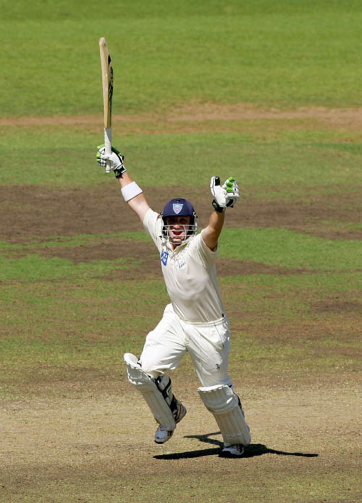 Philip Hughes is delighted after bringing up his maiden first-class ...