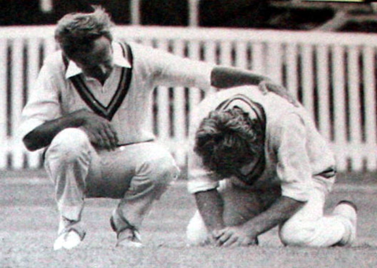 A distraught Peter Lever is comforted by Derek Underwood | ESPNcricinfo.com