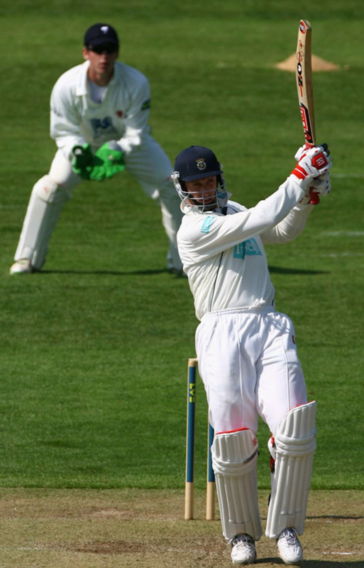 John Crawley rocks back to pull on his way to a half-century ...