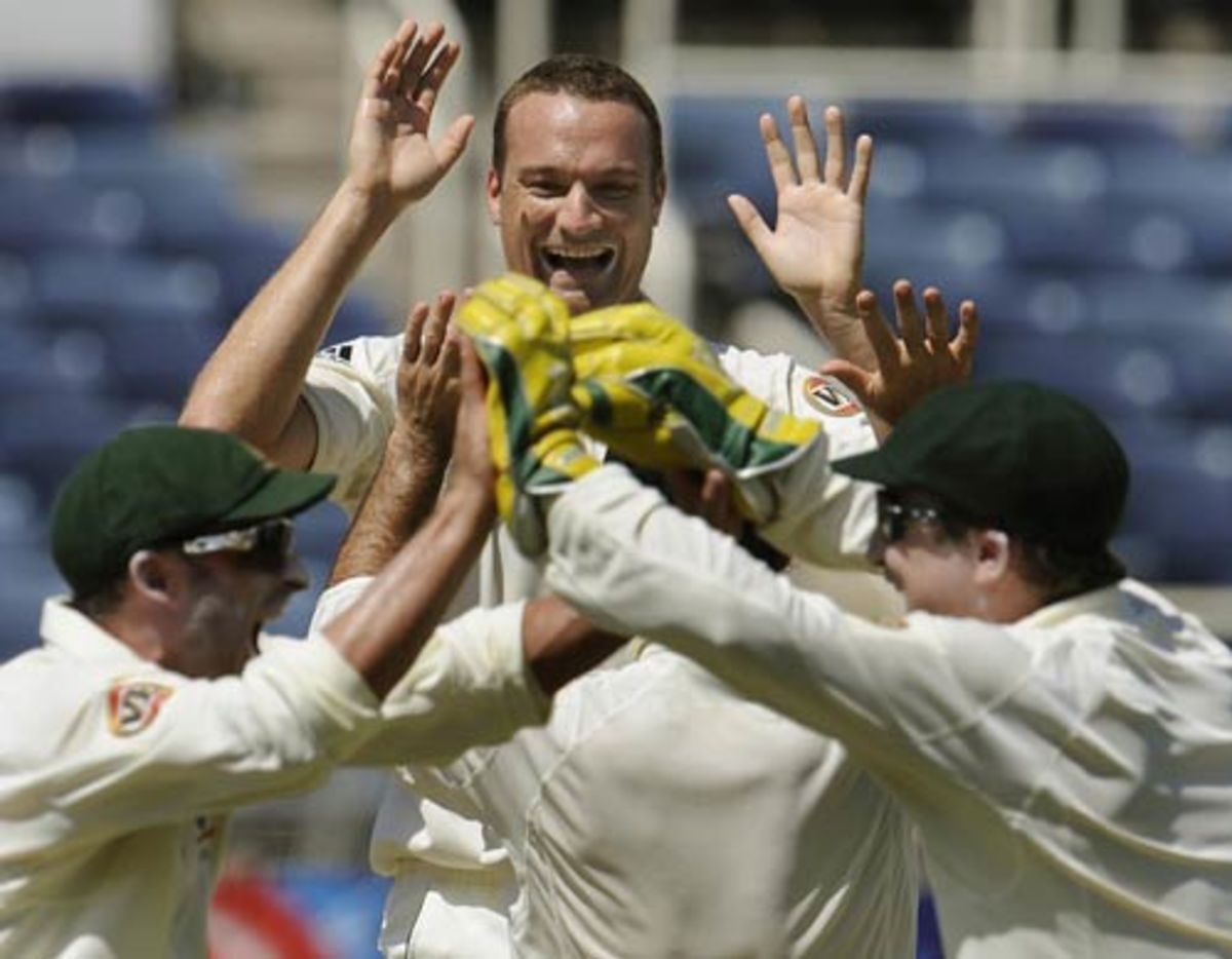Stuart Clark is congratulated on one of his five wickets | ESPNcricinfo.com
