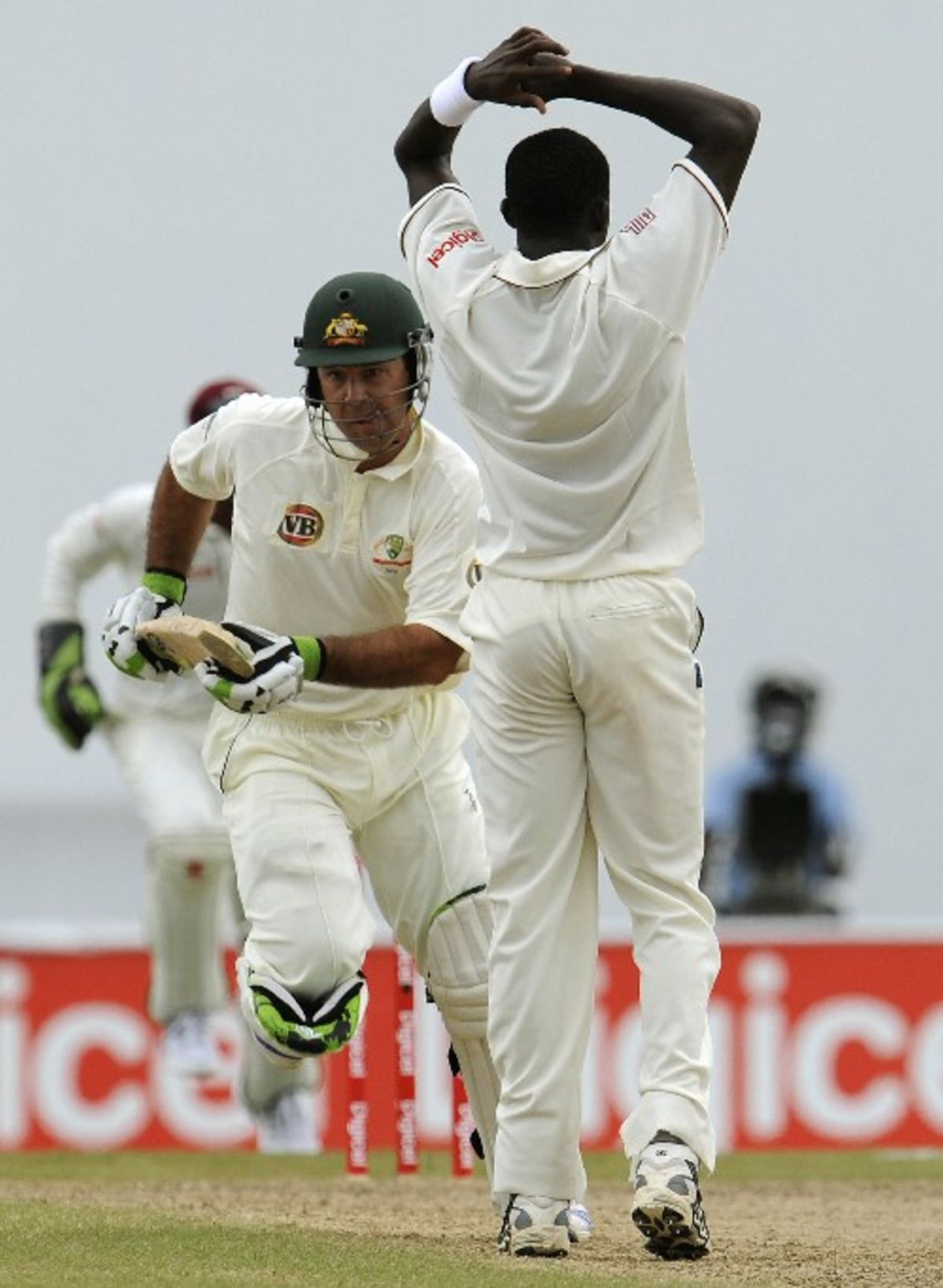 Ricky Ponting runs past Fidel Edwards | ESPNcricinfo.com