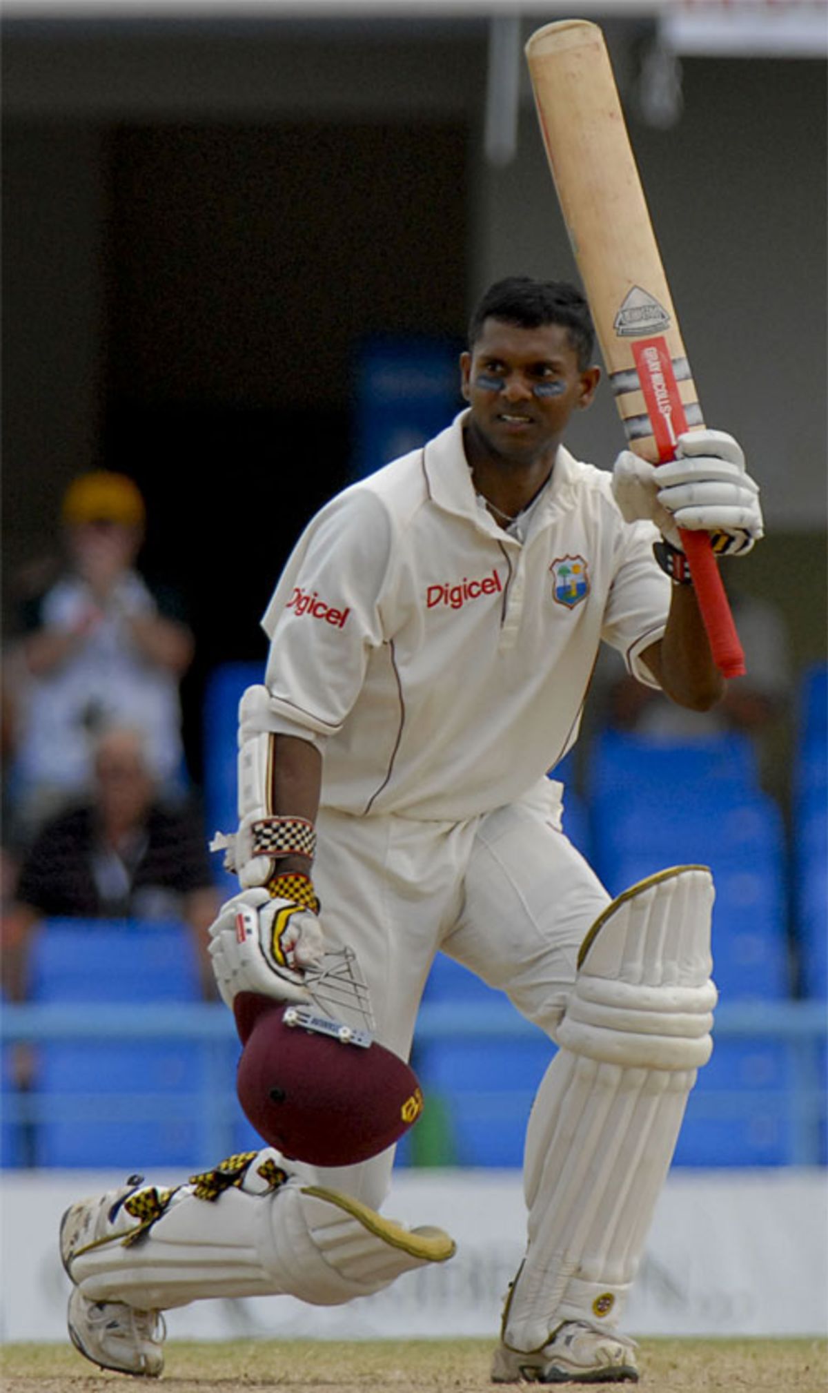Shivnarine Chanderpaul kisses the pitch after bringing up his second ...