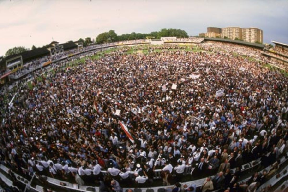 The crowd invades the ground after India's historic win | ESPNcricinfo.com