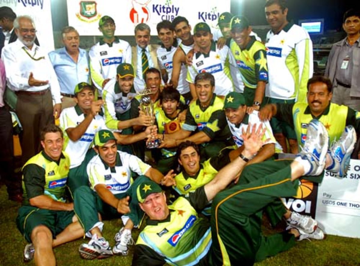 A happy Pakistan camp pose with the silverware | ESPNcricinfo.com
