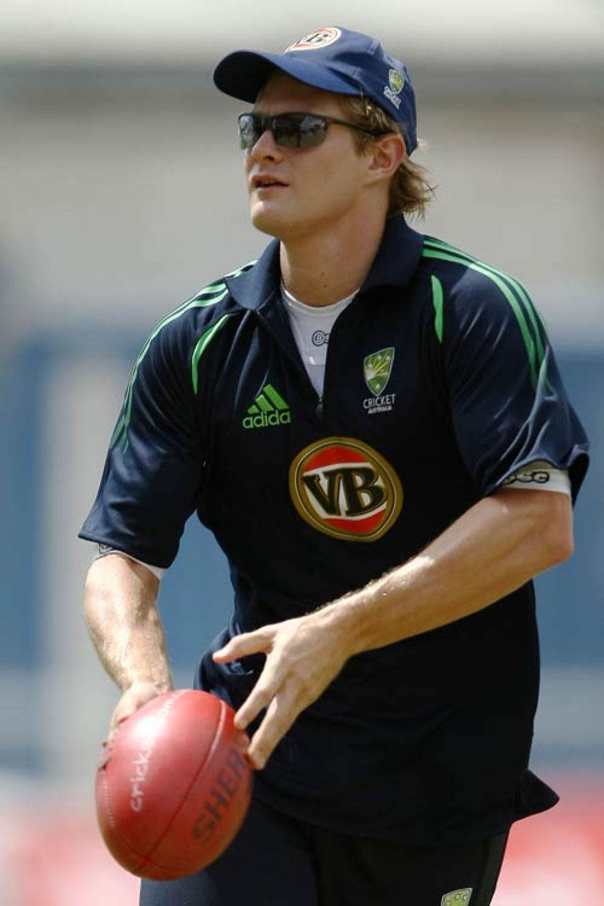 Shane Watson throws a football at Australia's training session ...