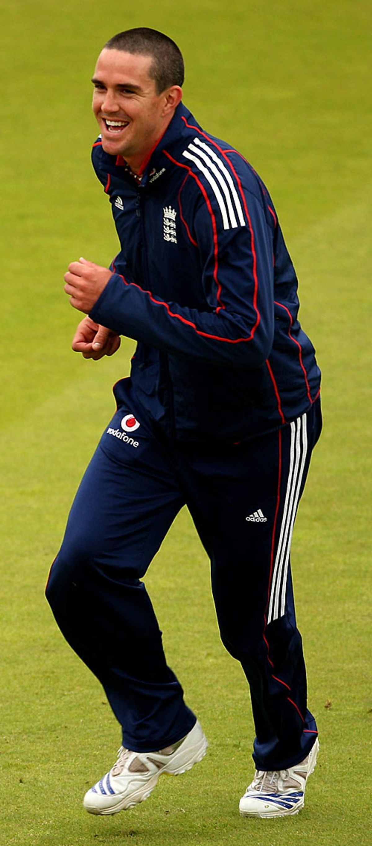 A tracksuited Kevin Pietersen smiles ahead of his first game in charge ...