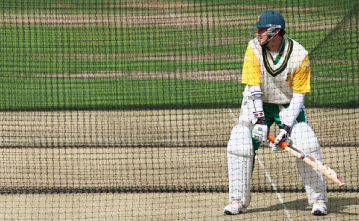 Jeff Evans raises his finger as David Balcombe celebrates running out ...