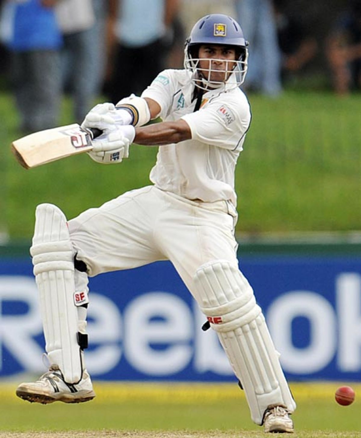 Malinda Warnapura cuts during his century | ESPNcricinfo.com
