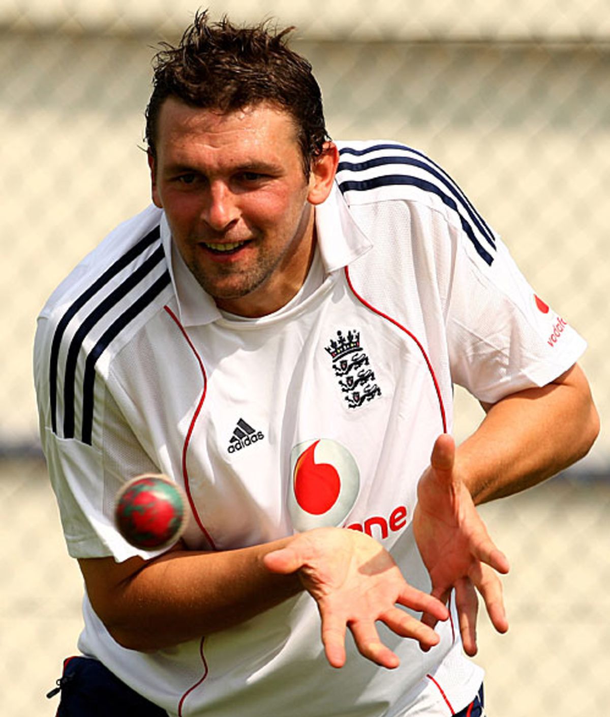 Steve Harmison bowls in the Edgbaston nets, watched by Peter Moores ...