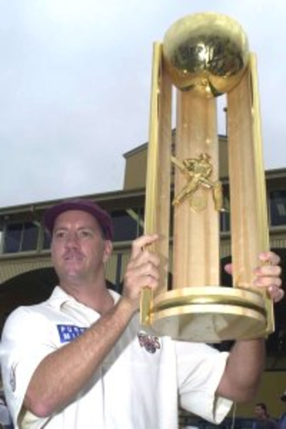 Stuart Law holds the Cup triumphantly, Queensland v Victoria, Pura Milk ...