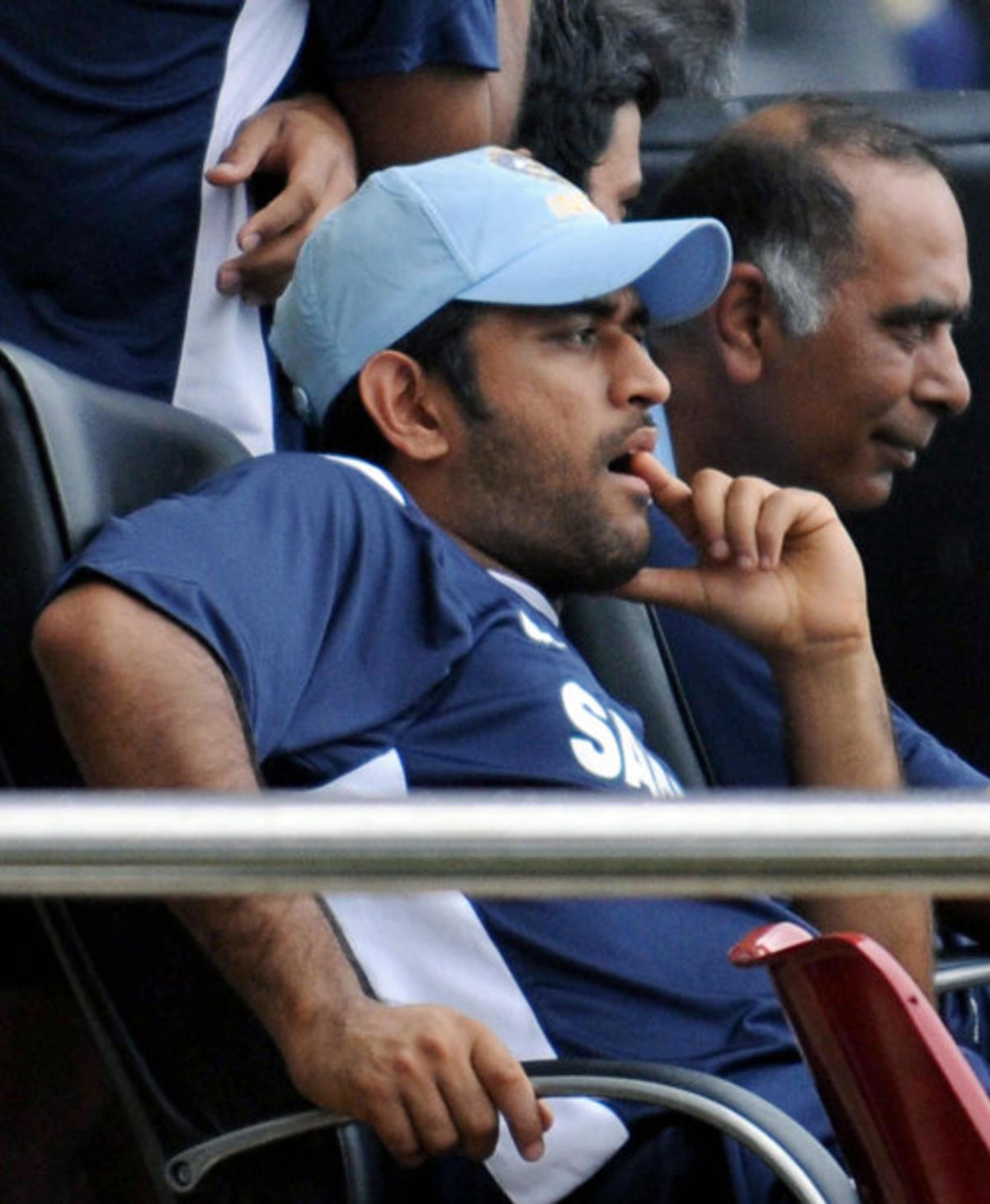 Mahendra Singh Dhoni looks on from the dressing room as the rain ...