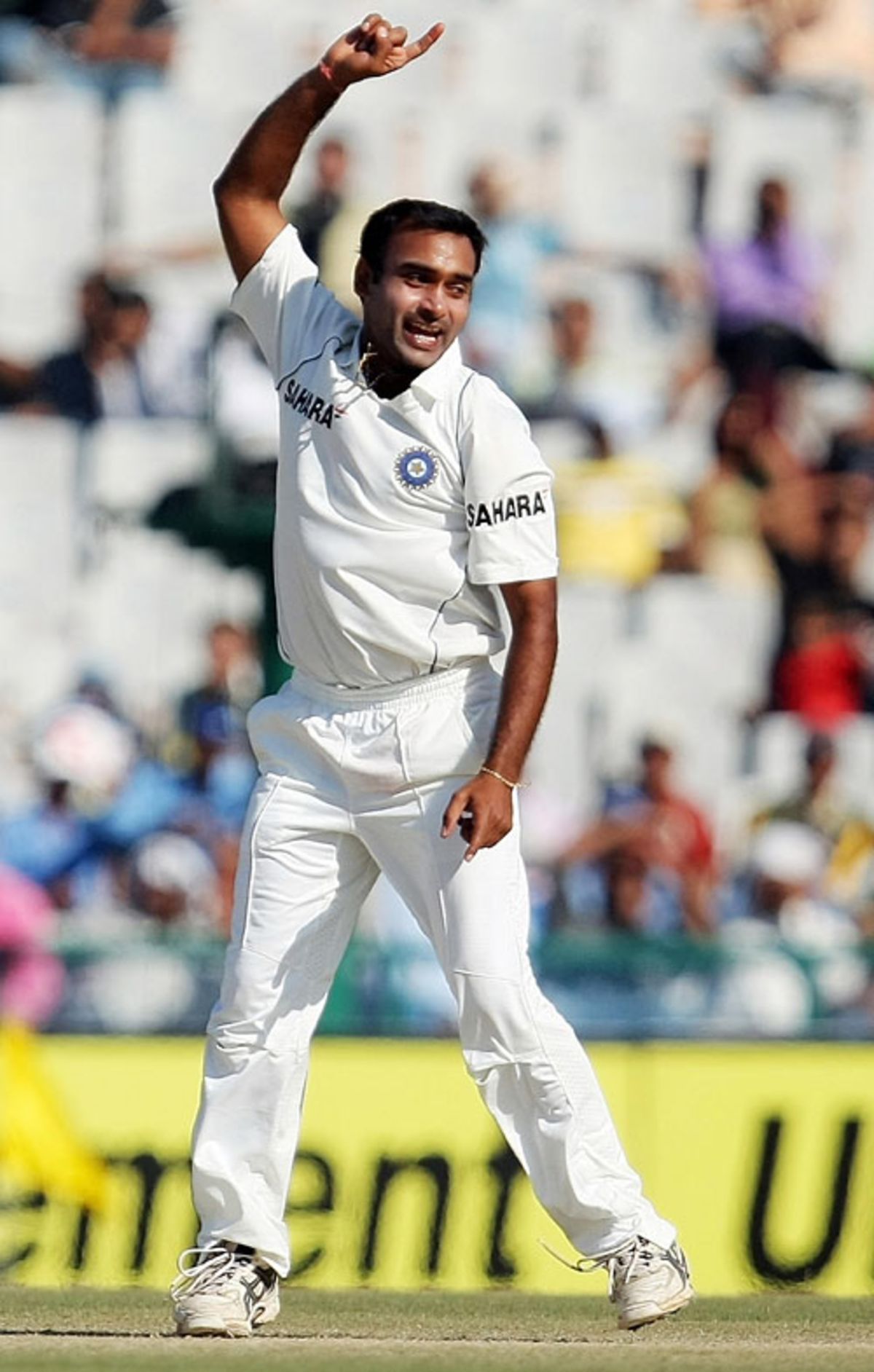 Amit Mishra celebrates during his 5 for 71 on debut | ESPNcricinfo.com
