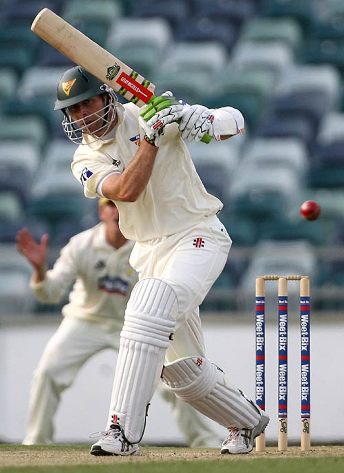 Michael Dighton drives through the on side | ESPNcricinfo.com