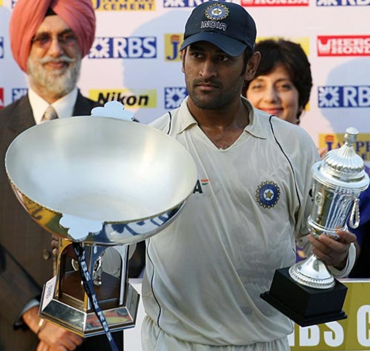 Mahendra Singh Dhoni with his trophies | ESPNcricinfo.com
