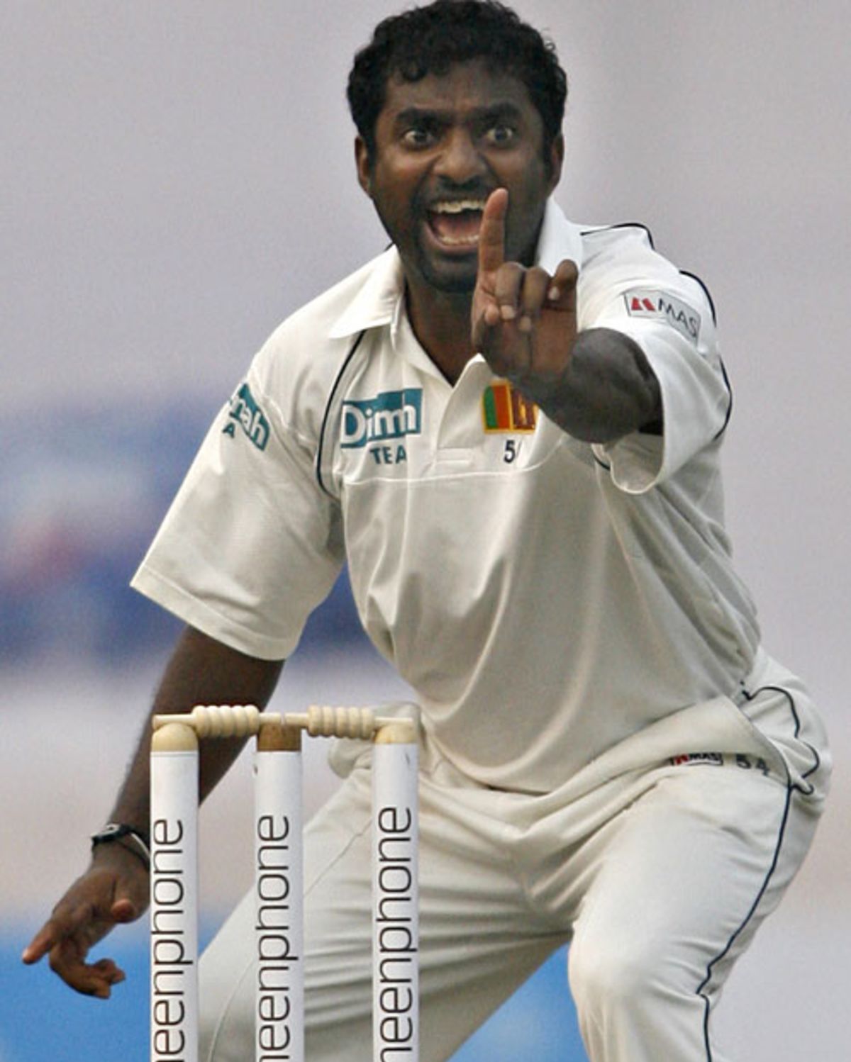 Muttiah Muralitharan celebrates a wicket during his five-for ...
